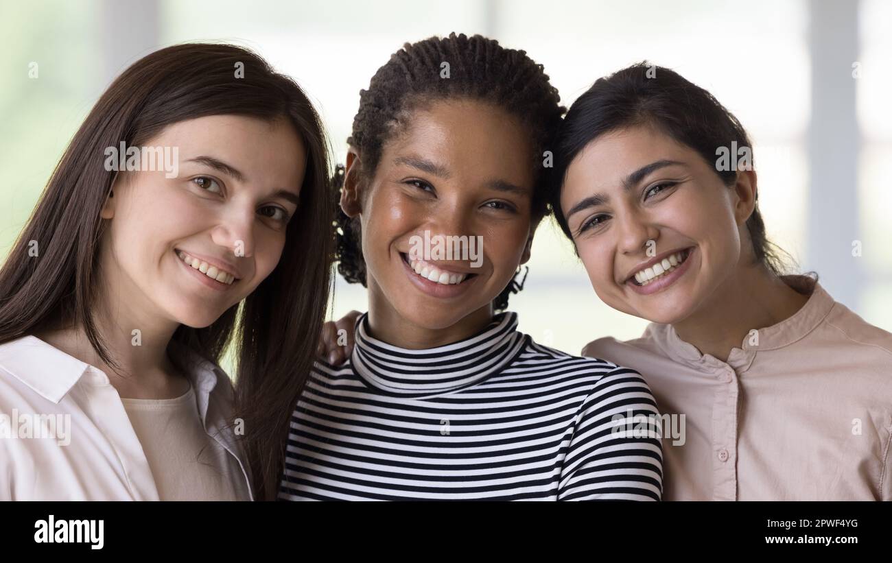 Close up portrait of three beautiful multiethnic girls Stock Photo - Alamy