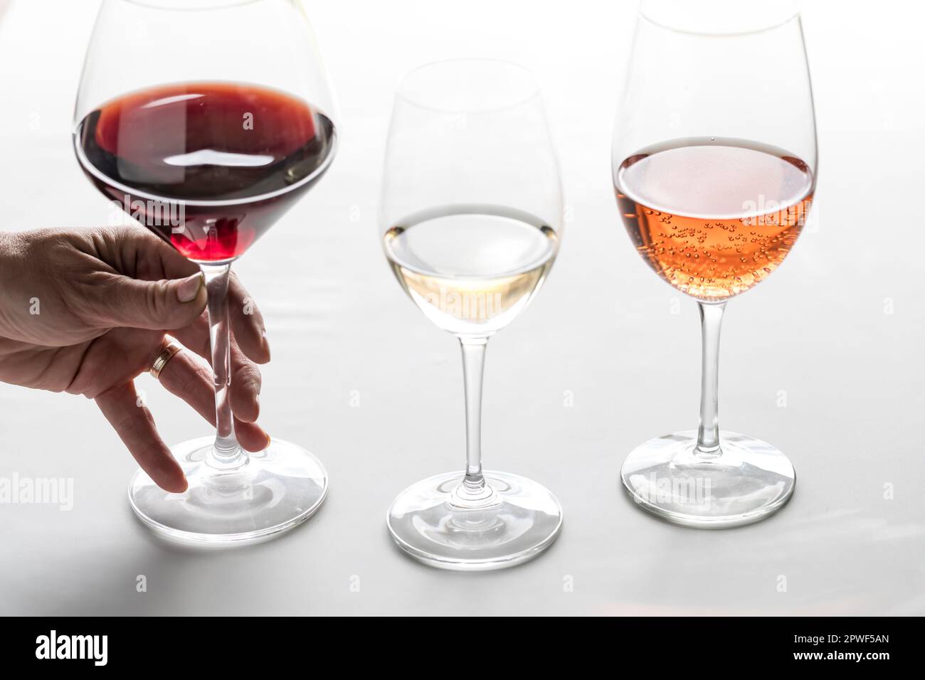 Red, white and rose wine against a bright white background Stock Photo ...