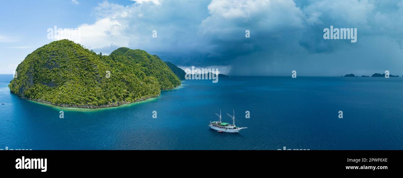 Coral reefs surround the dramatic limestone islands that have been ...