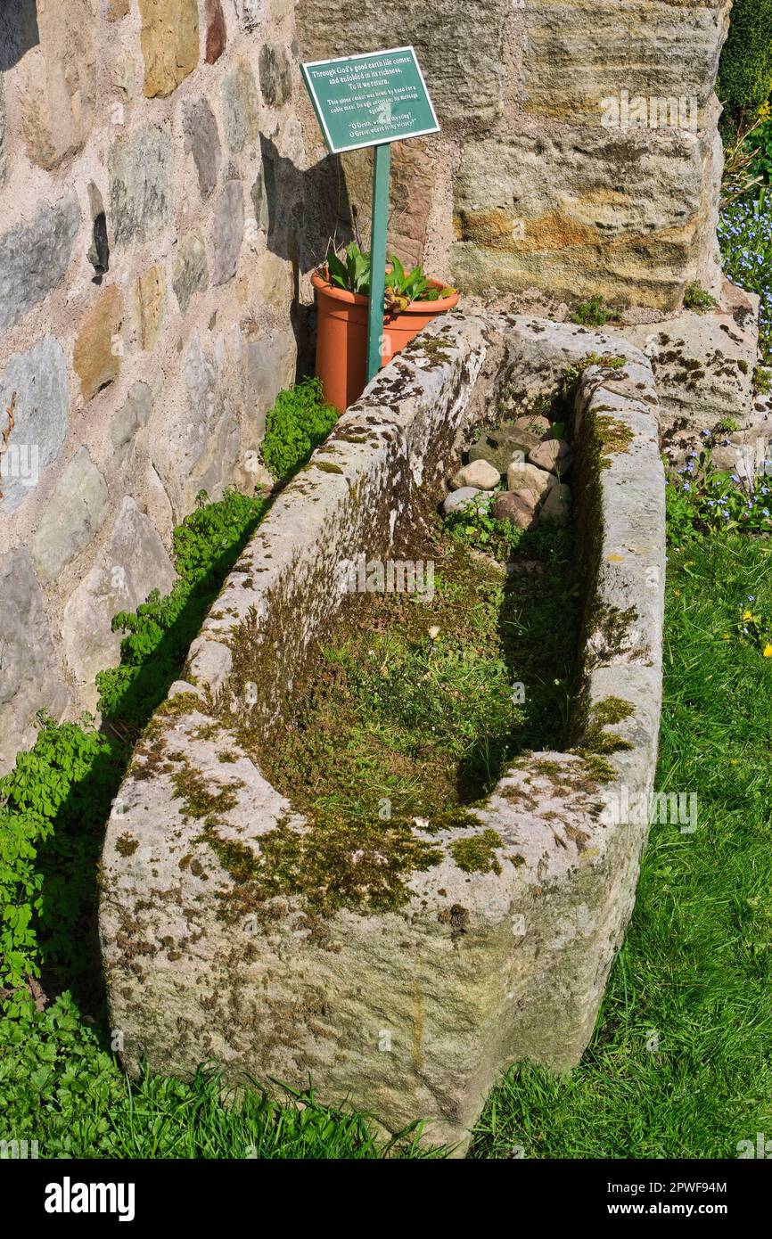 Stone coffin outside St Mary's Church, Kirkby Lonsdale, Cumbria Stock ...