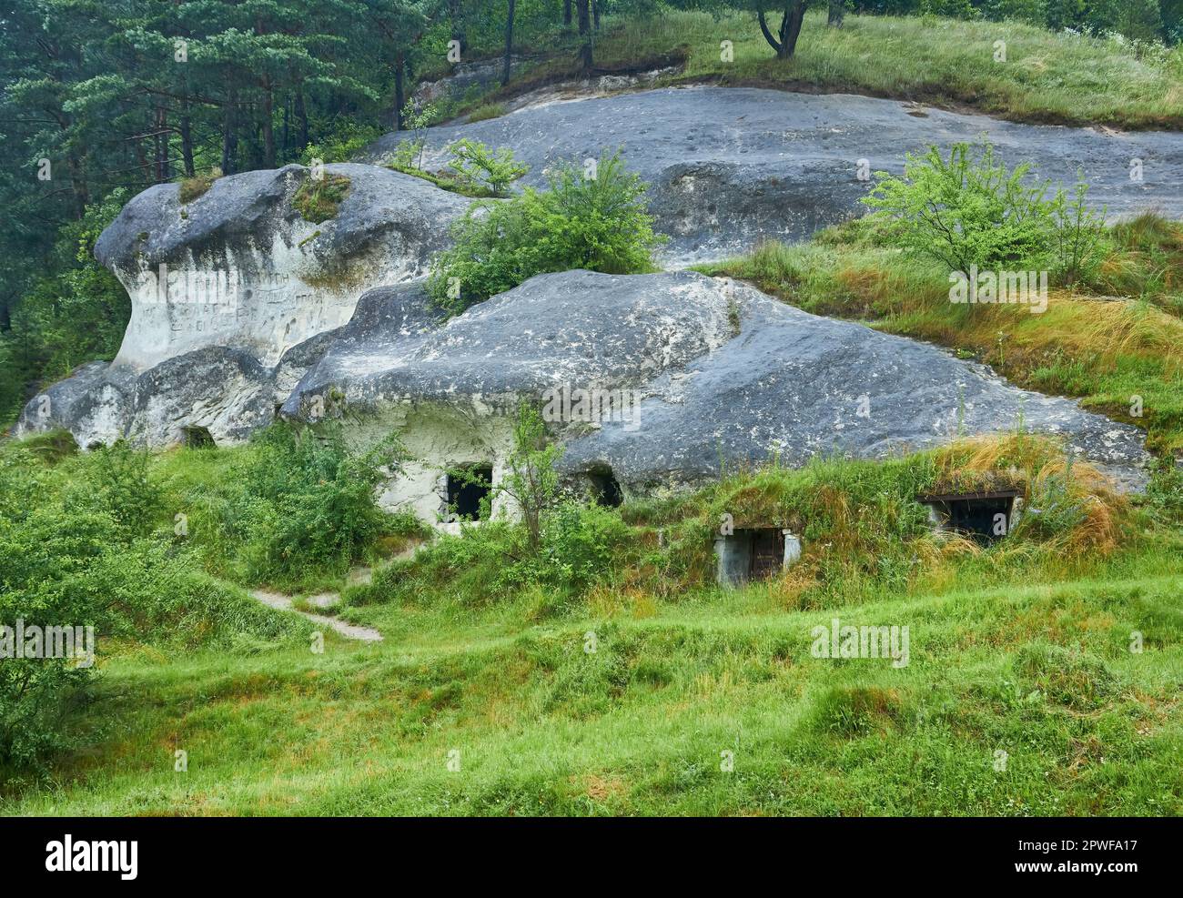 Big old cave houses from outside, rainy weather Stock Photo - Alamy