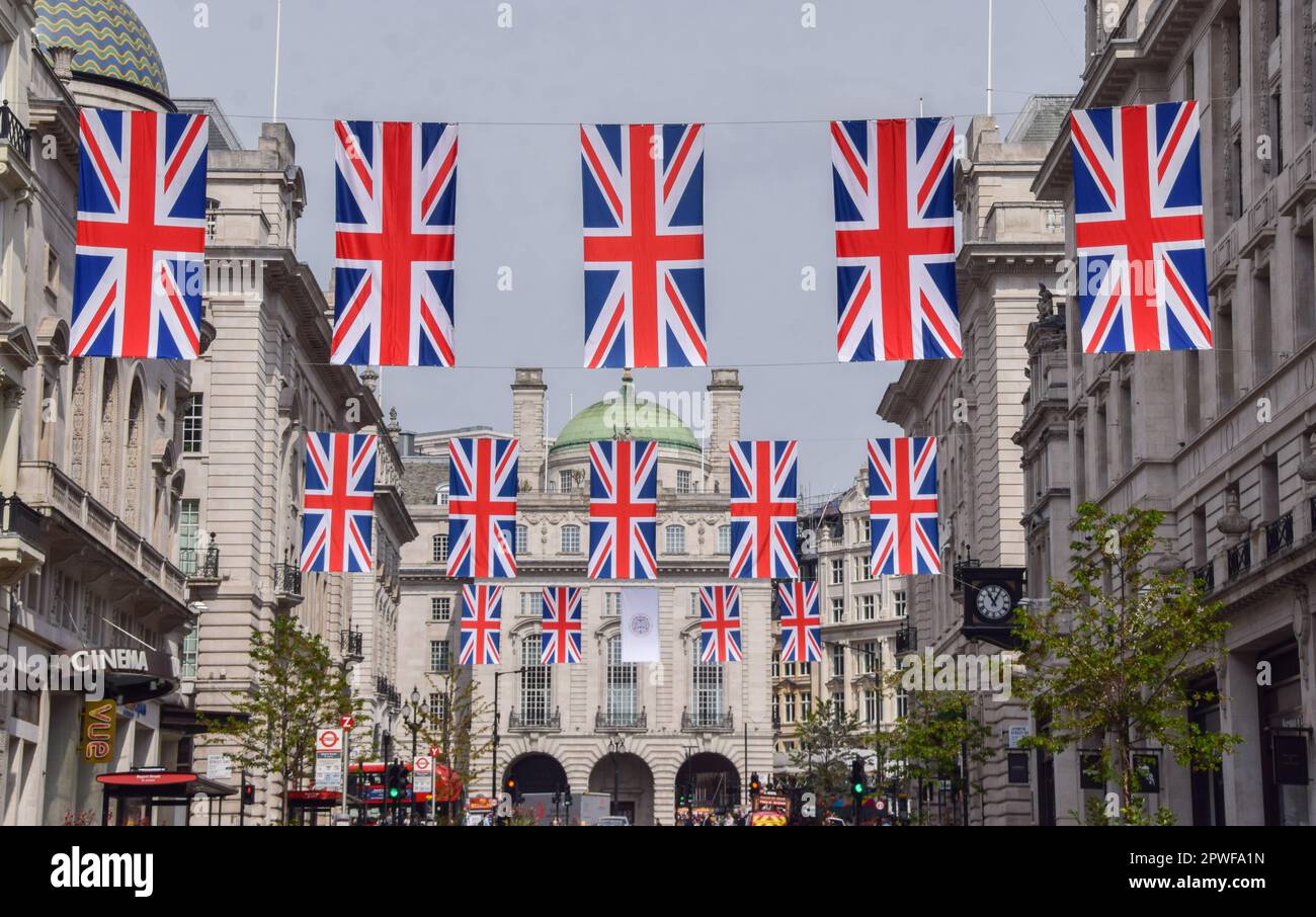London, UK. 30th April 2023. Union Jacks decorate Regent Street ahead ...