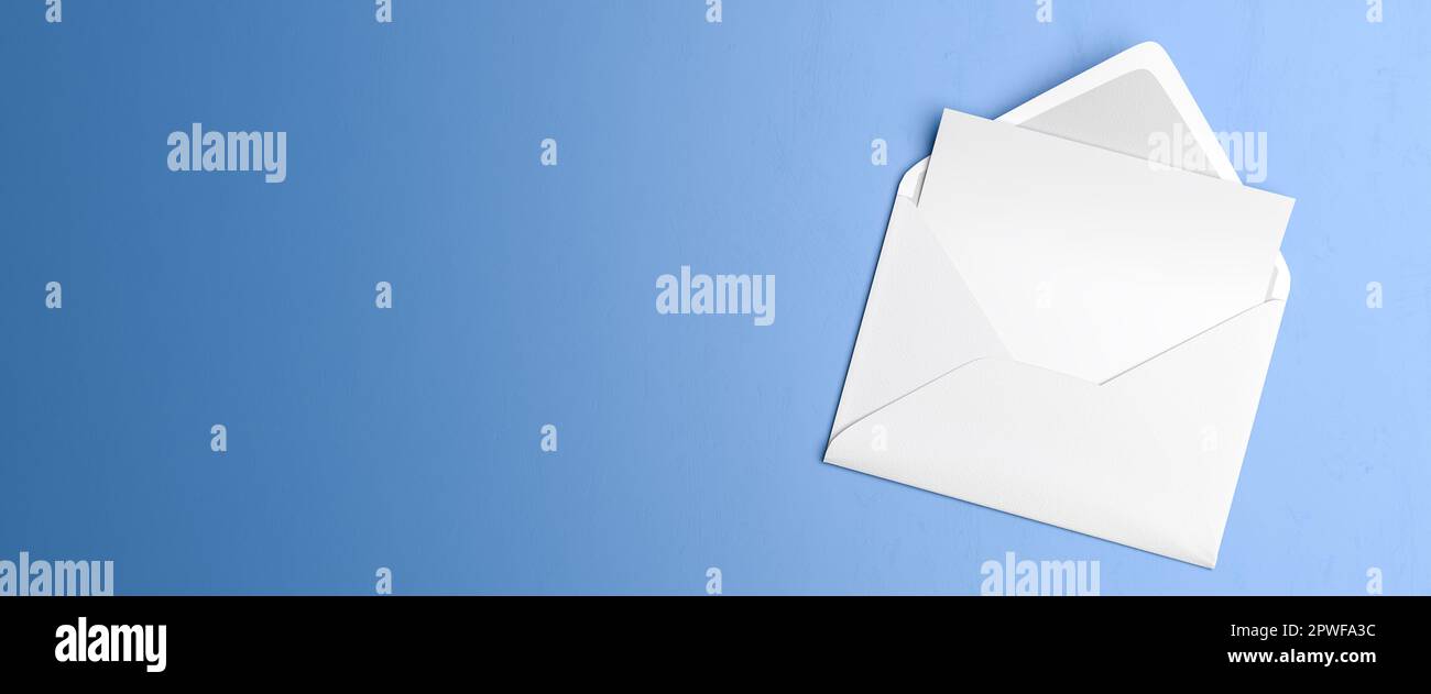 Blank letter in an envelope on blue table background. Mockup for own ...