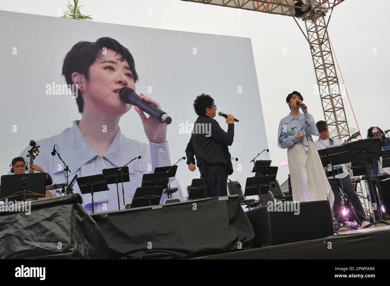 Anthony Lun Wing-Leung and Yoyo Sham perform in "Outdoor Music x Film ...