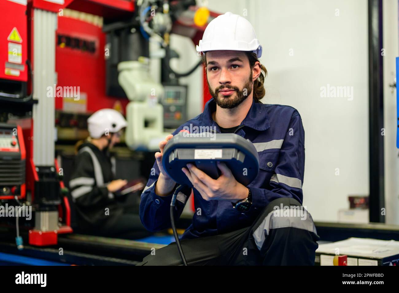 Industrial automatic robotic arm hi-res stock photography and images ...