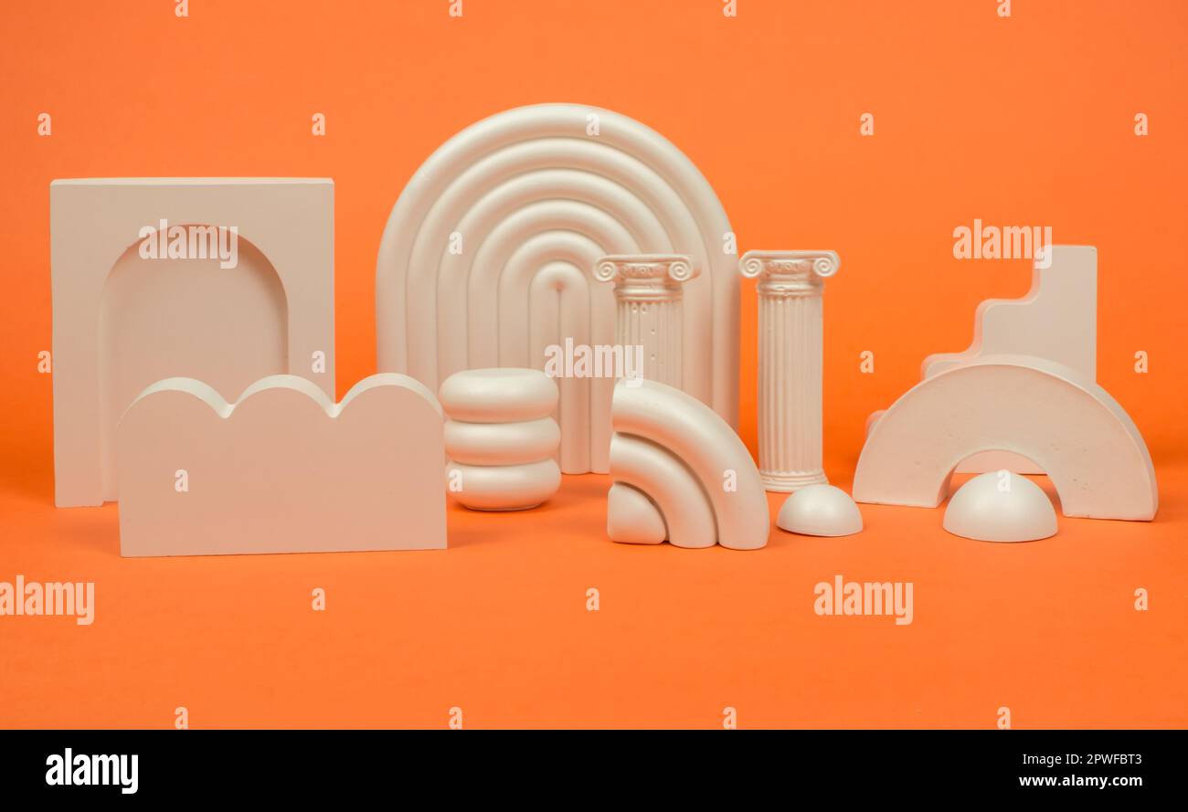 Gypsum geometric shapes for trendy product photography on an orange ...