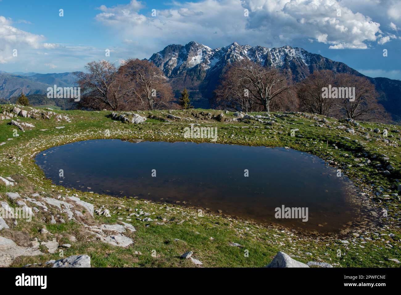 Pond where the snow-capped mountains are reflected Stock Photo - Alamy