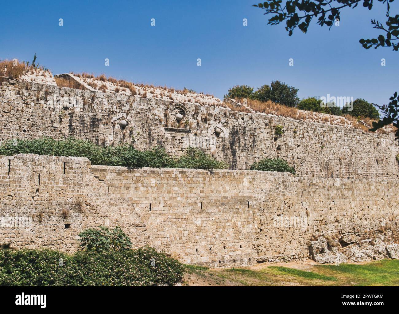 Walls and fortifications of the medieval citadel of Rhodes in Greece ...