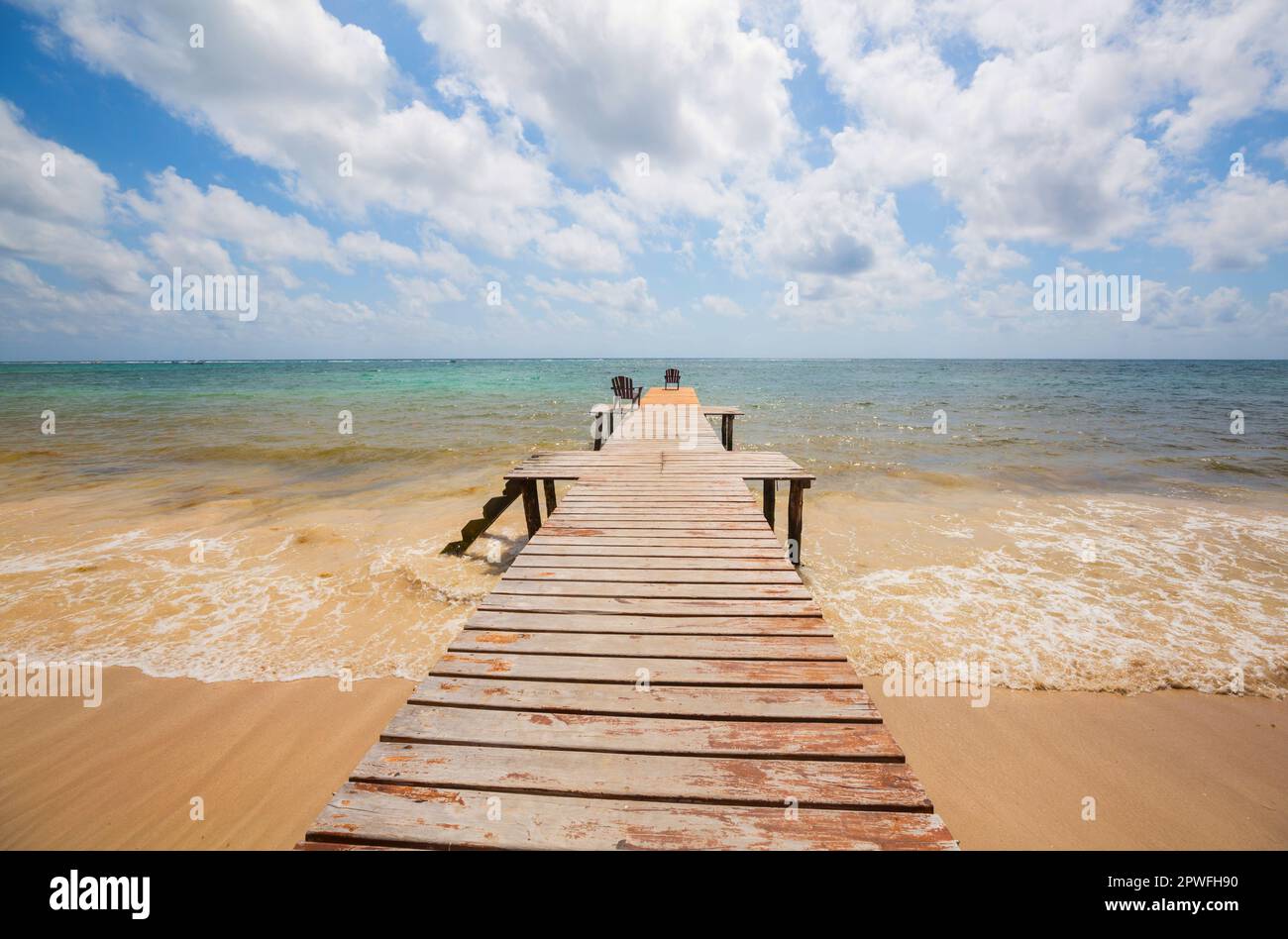 boardwalk on the tropical beach Stock Photo - Alamy