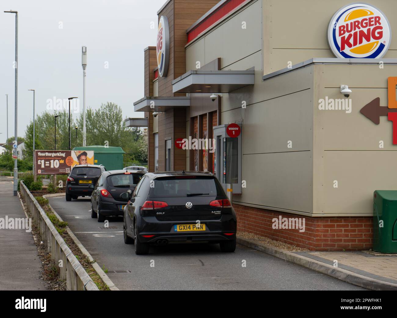 Cars queuing at a Drive Thru Burger King Restaurant Stock Photo - Alamy