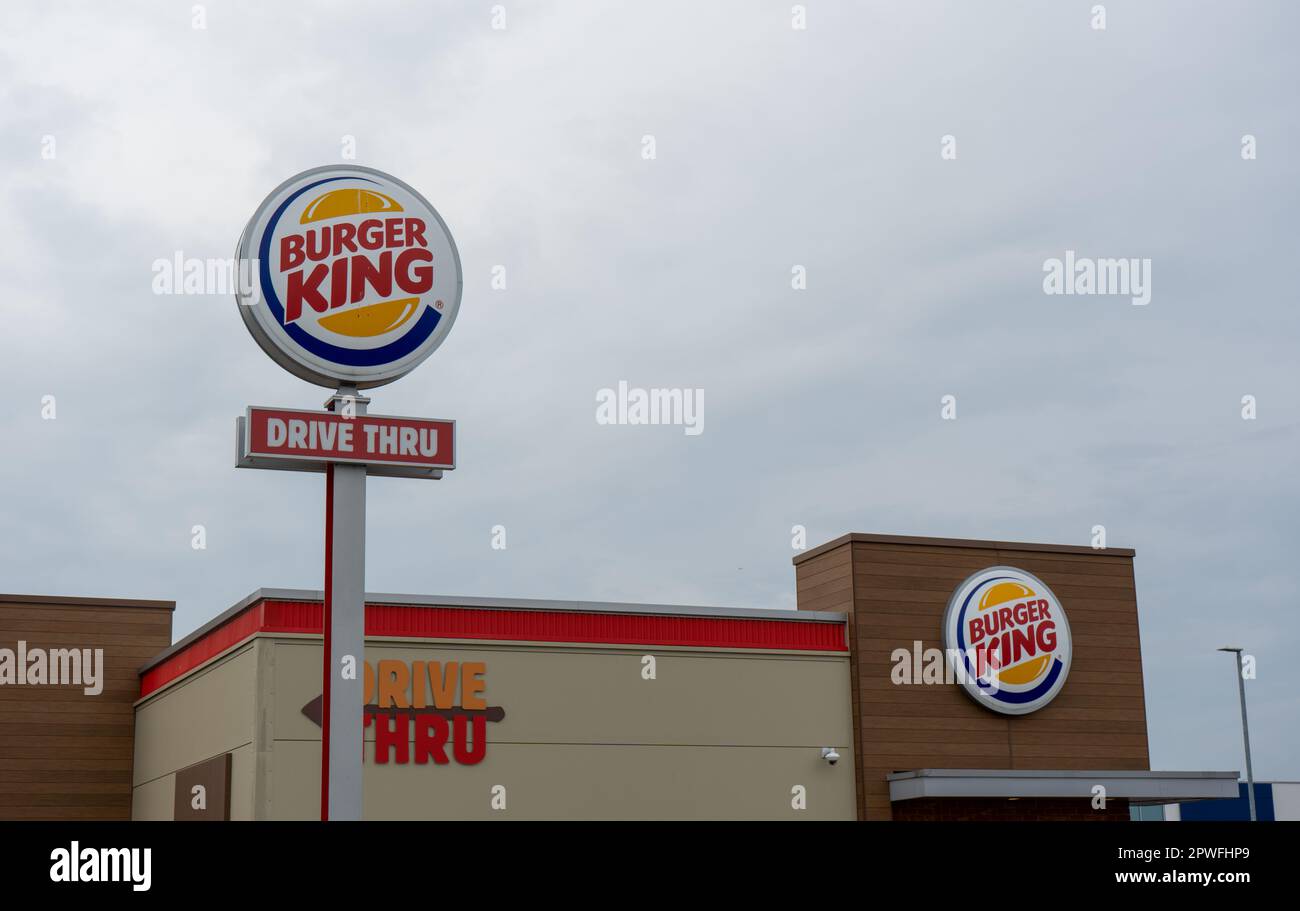 A sign outside a Burger King fast food restaurant advertising their ...
