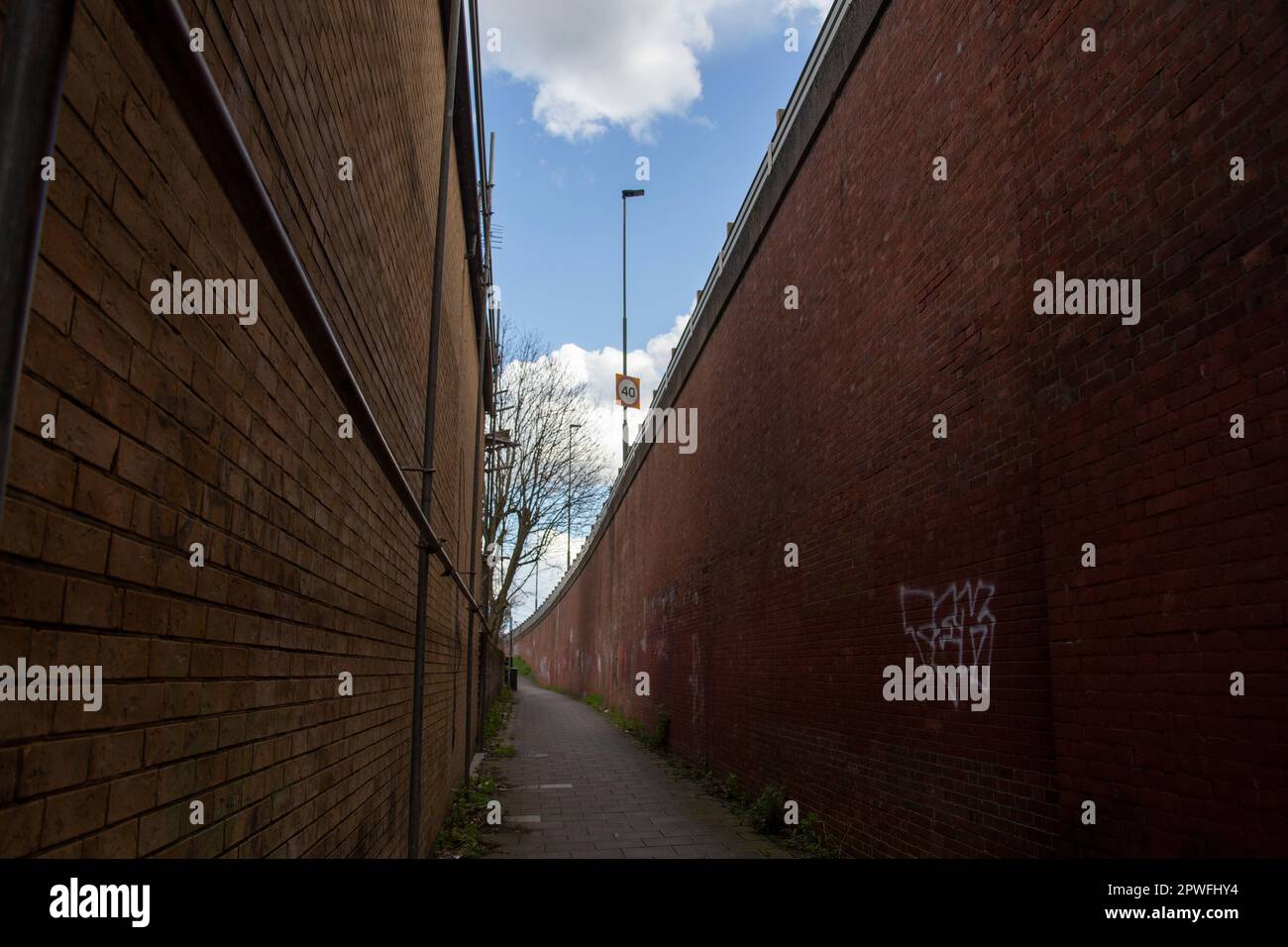 Narrow pedestrian alley, Chiswick, West London, UK Stock Photo - Alamy