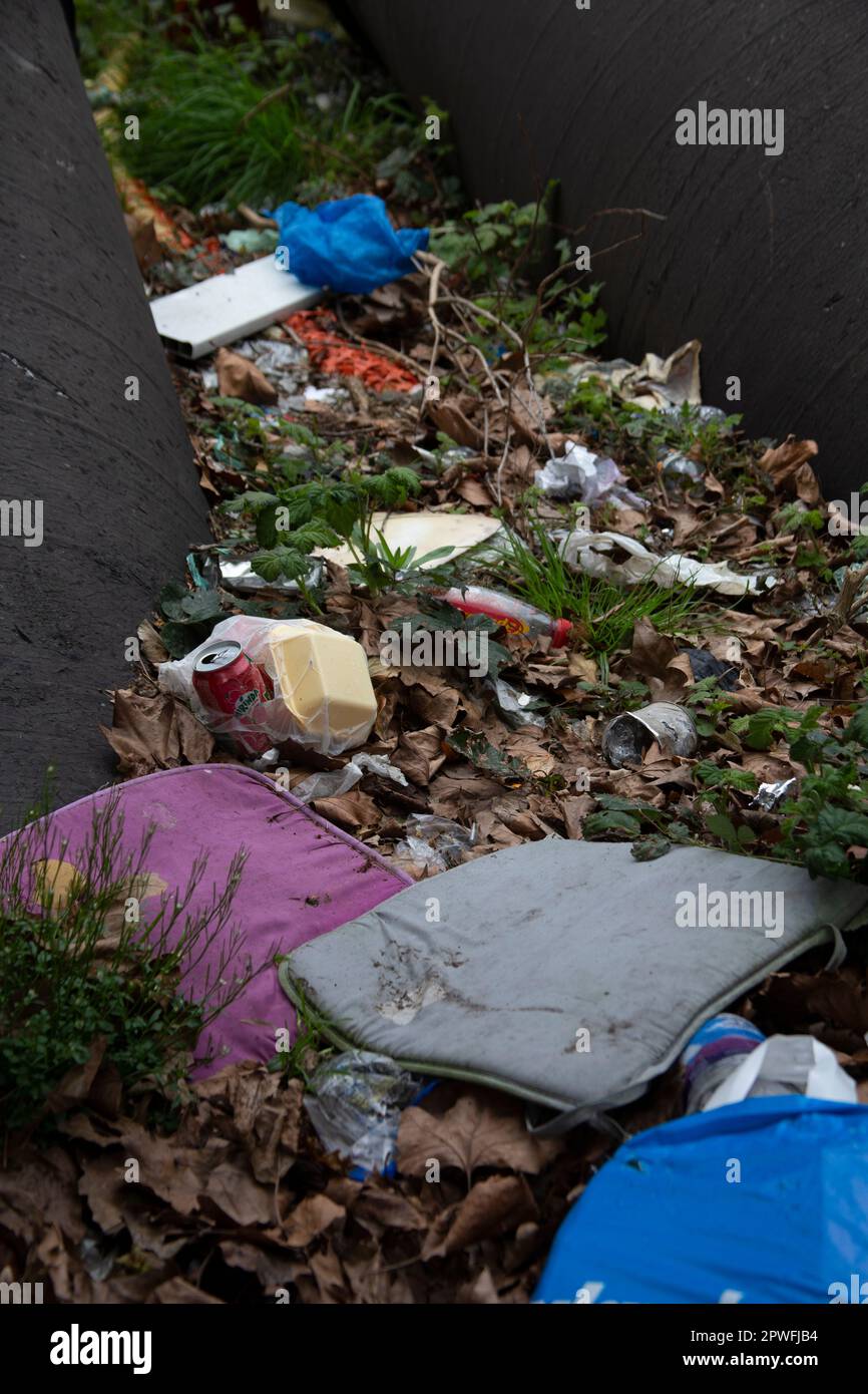 Illegally dumped waste on a piece of wasteland in Chiswick West London ...