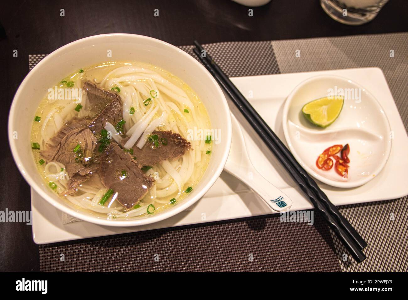 Typical hot Pho soup for vietnamese breakfast Stock Photo - Alamy