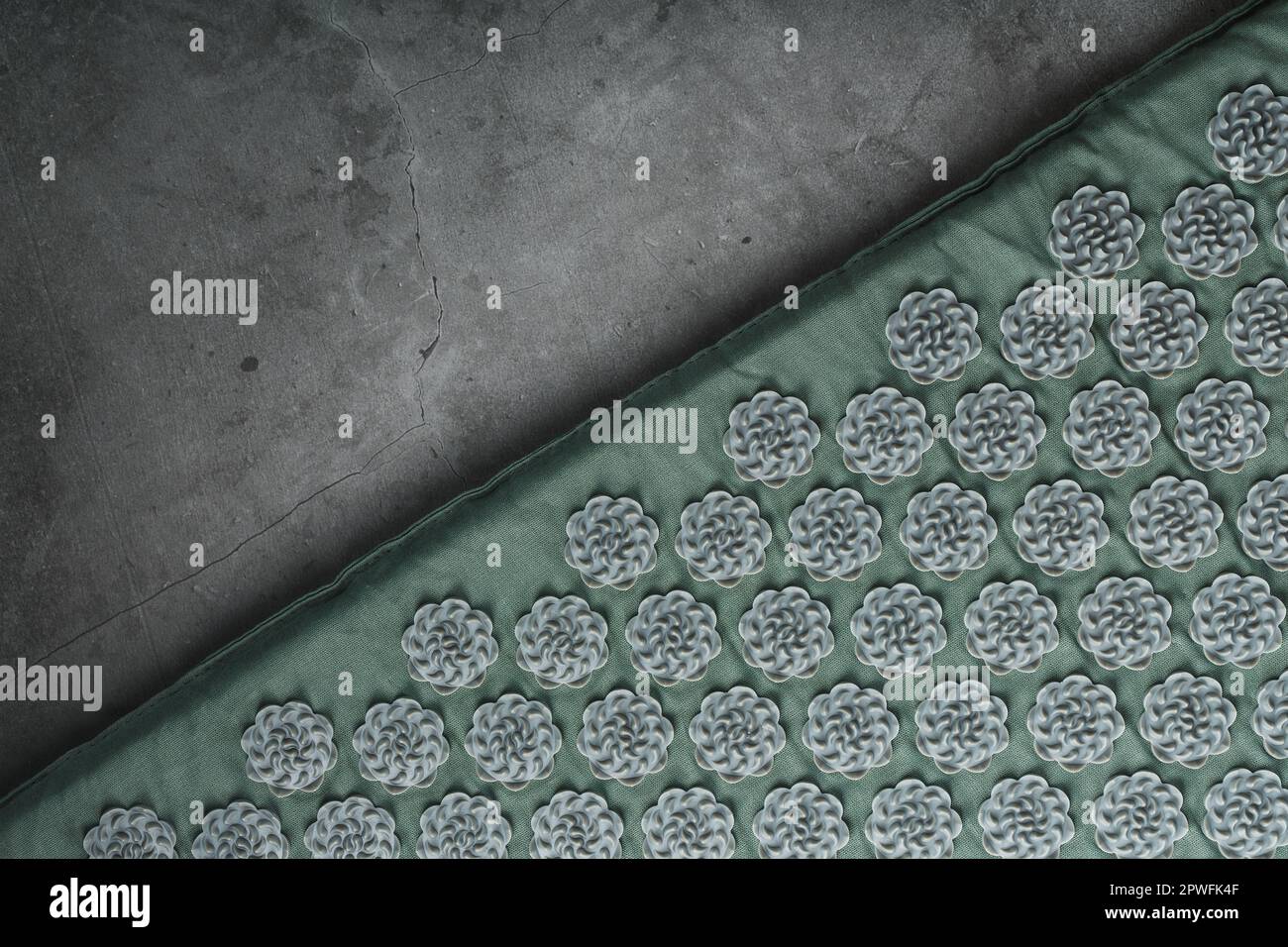 Massage mat with prickly spikes Kuznetsov applicator top view. On a ...