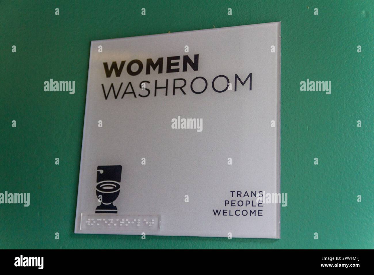 A sign welcoming Trans people to the ladies bathroom at Douglas Park in ...