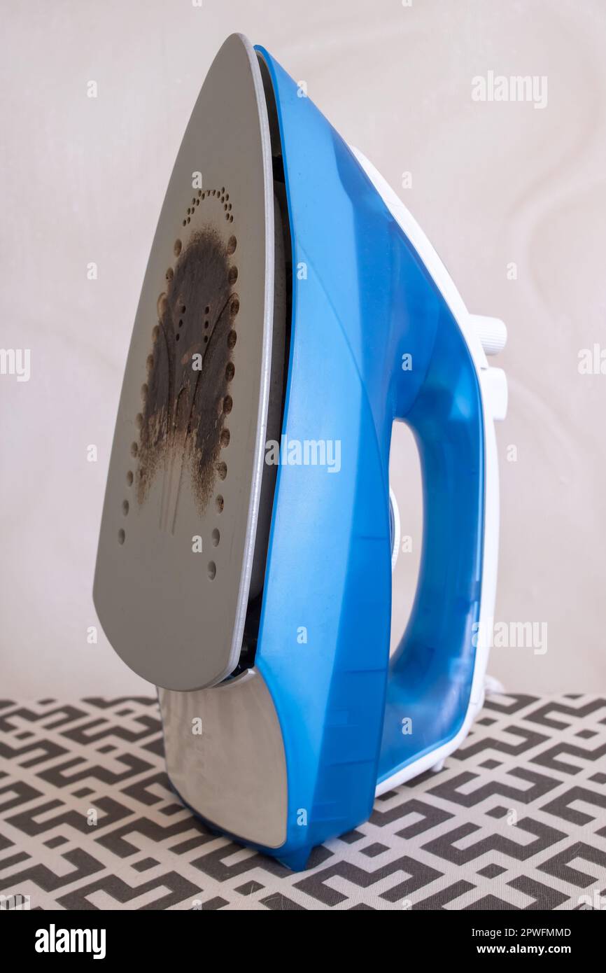 Burnt surface of iron closeup at home Stock Photo - Alamy