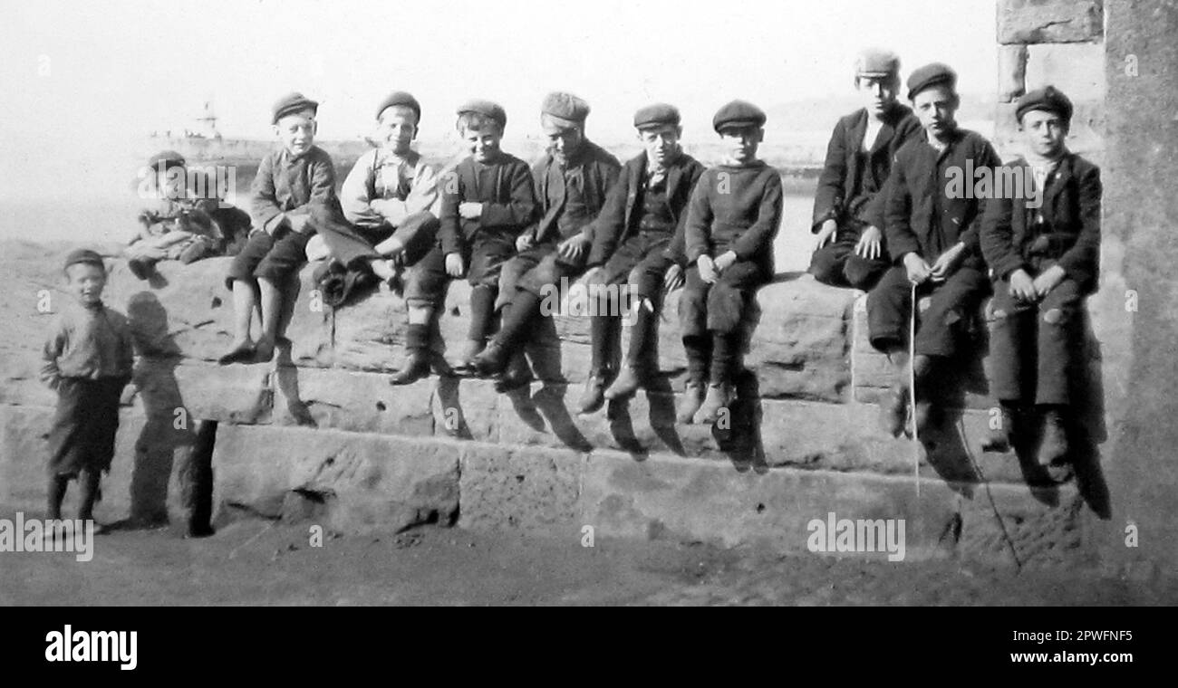 Group of boys, Whitehaven harbour, early 1900s Stock Photo - Alamy