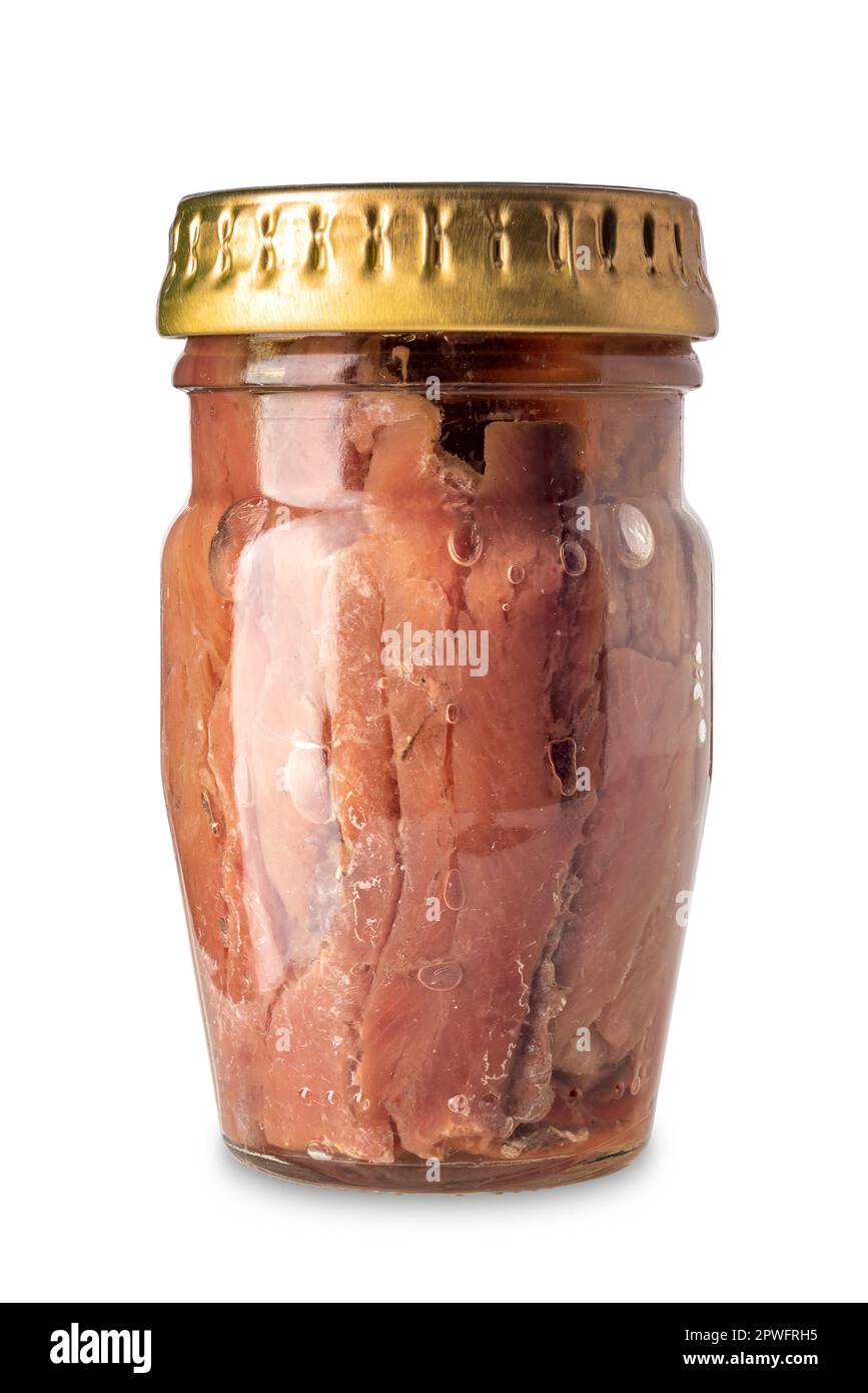 Canned anchovy fillets under oil in glass jar isolated on white with ...