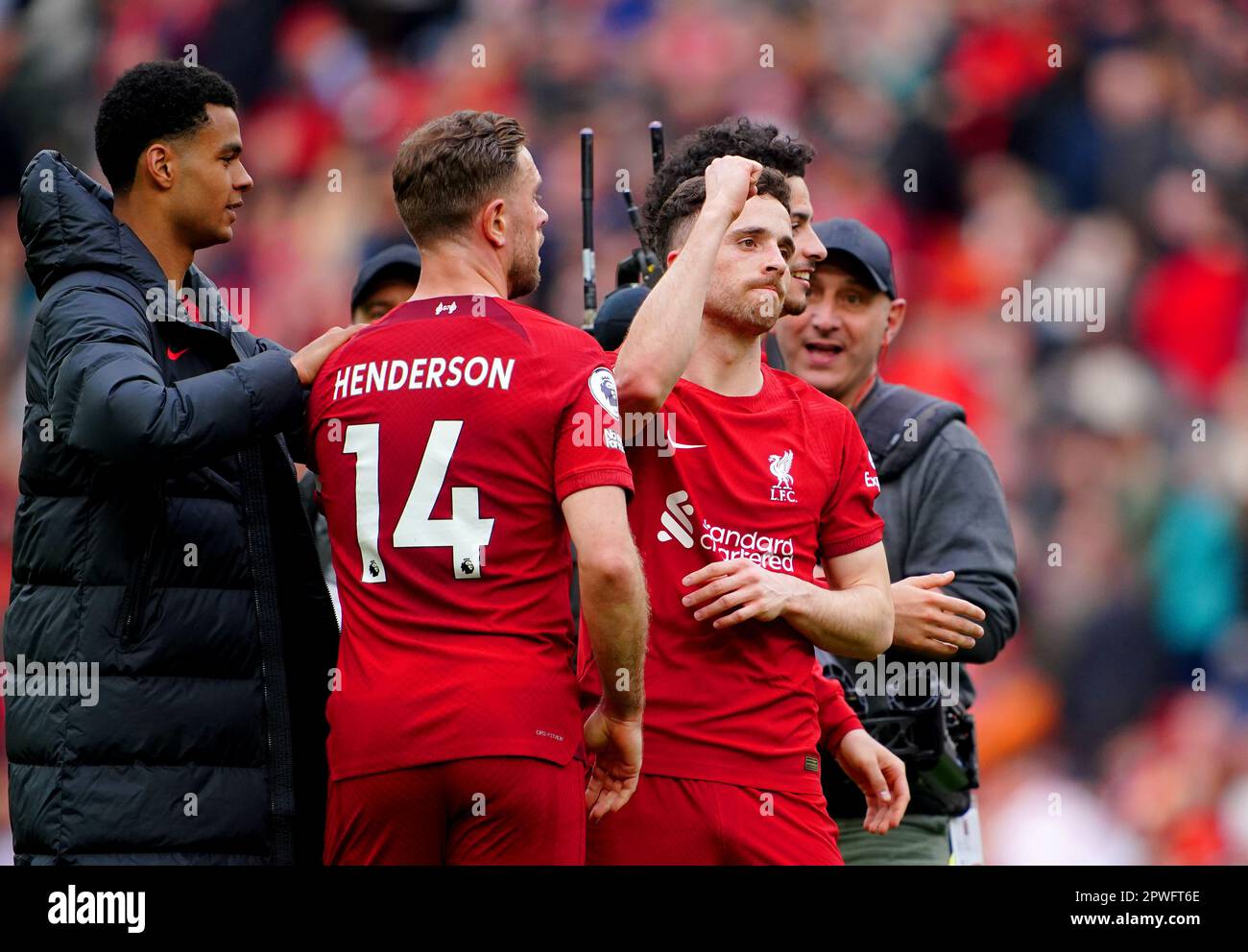 Liverpool's Diogo Jota (right) celebrates at the end of the Premier ...