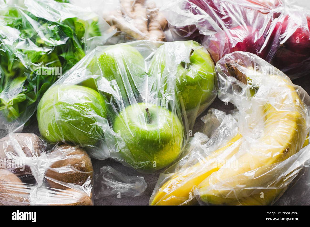 Fruits in Plastic Bags, Shopping with Plastic Bags, Recycling Concept ...