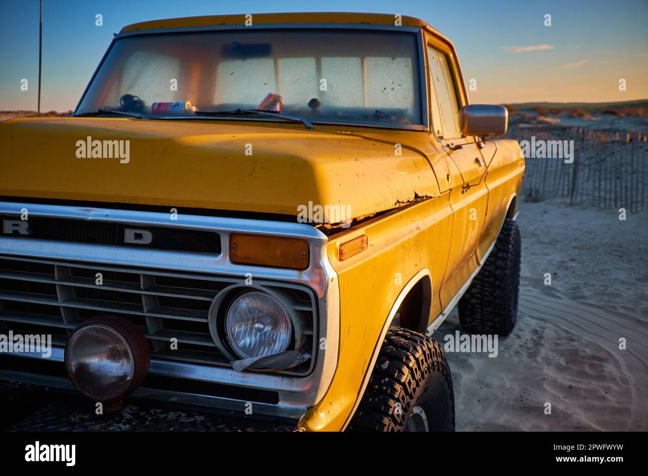 Mid 70's Ford F-150 yellow pickup truck Stock Photo - Alamy