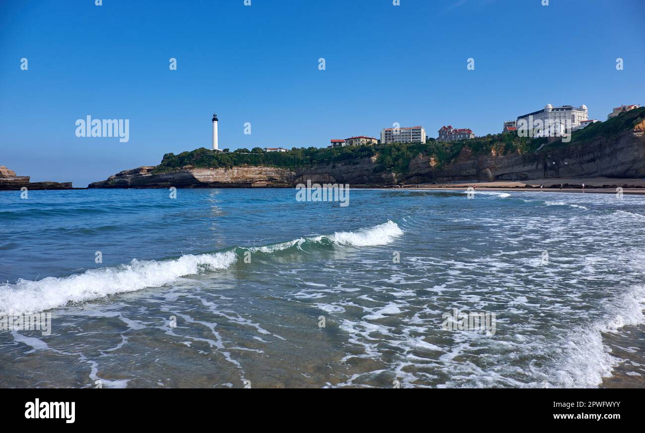 Large view on the beach of Biarritz and its lighthouse Stock Photo - Alamy