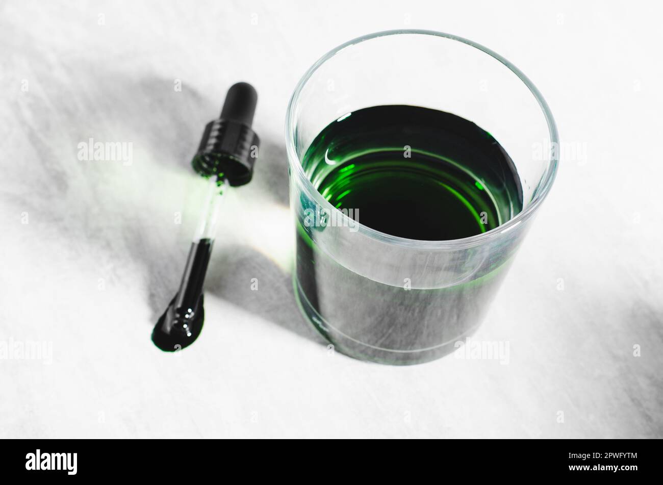 Liquid Chlorophyll in a Glass of Water, Superfood, Healthy Eating ...