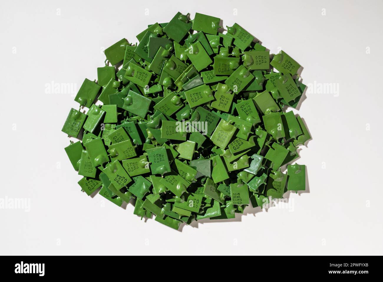 Many vintage green ceramic capacitors,close up, electronics industrial ...