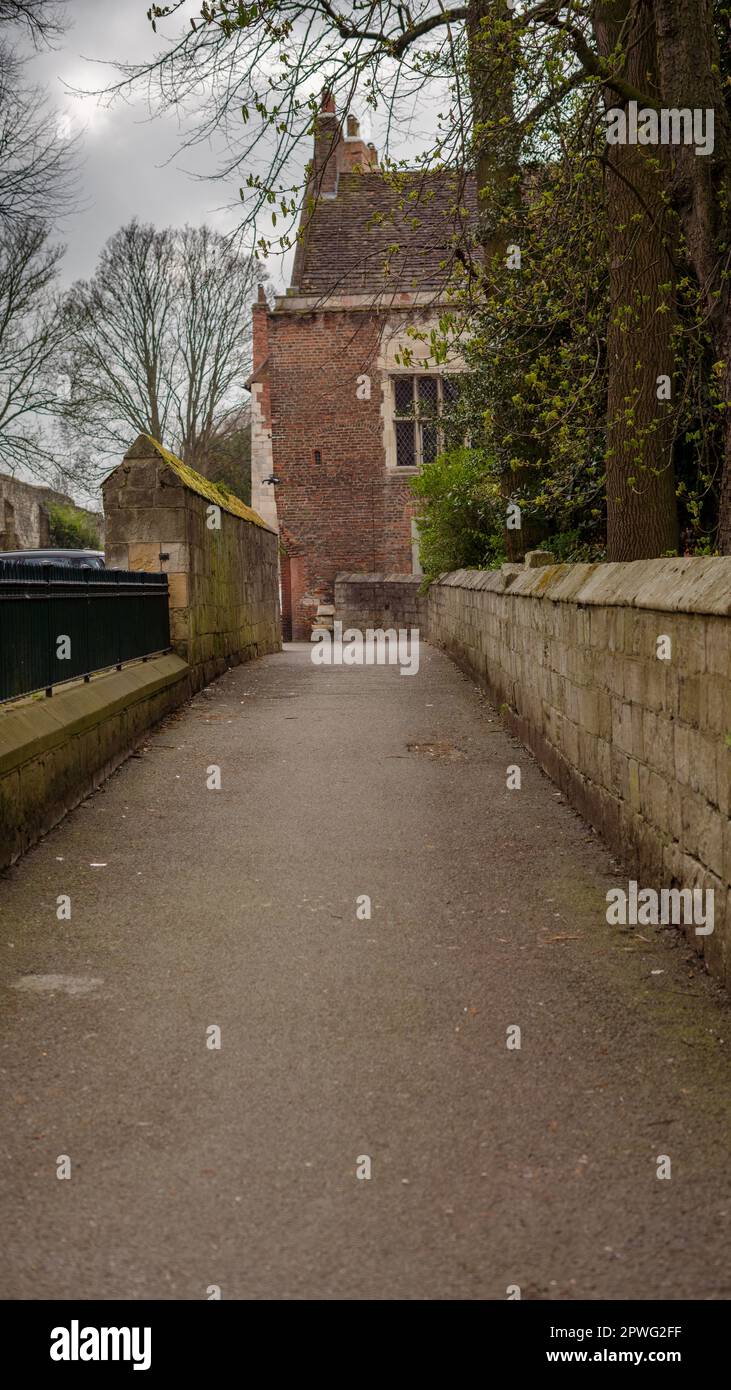 A grand building with intricate architecture stands tall surrounded by ...