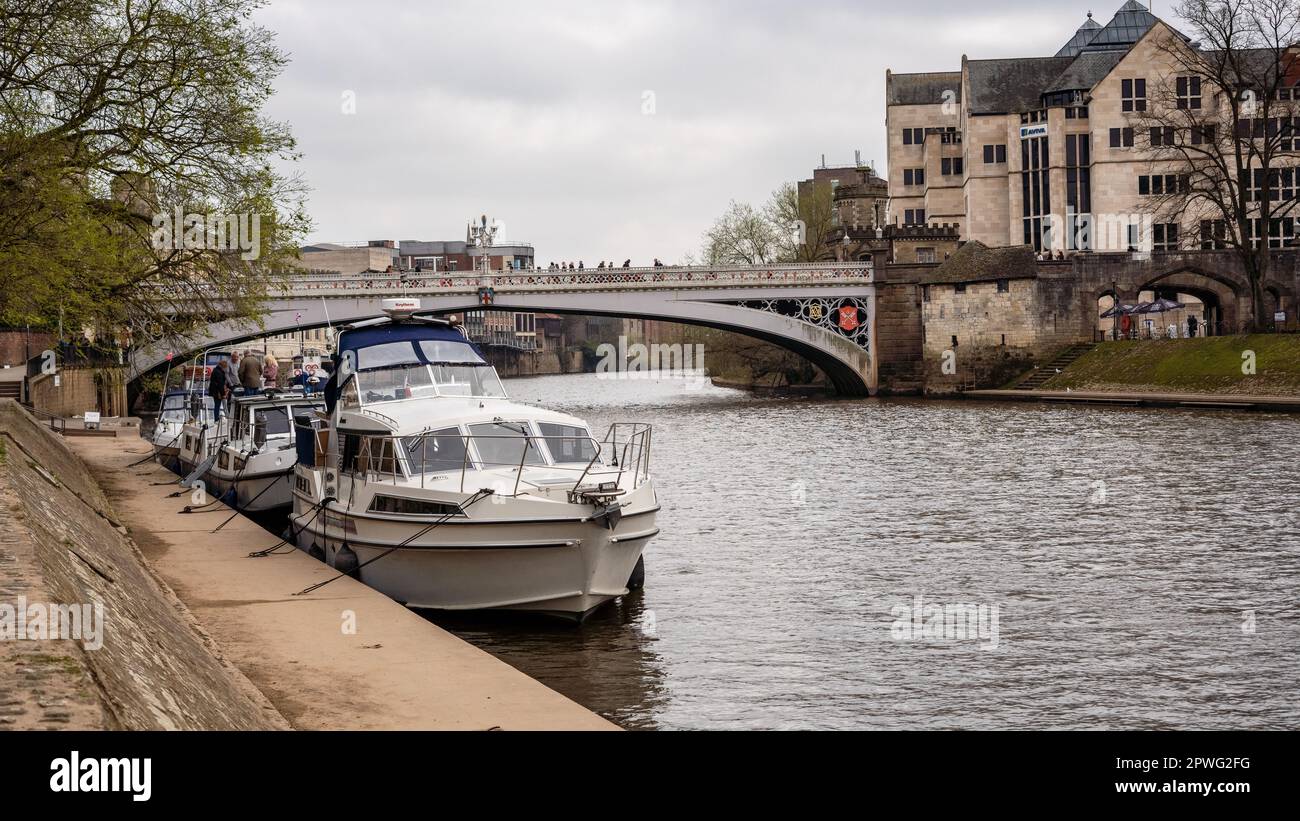 York England a bustling cityscape of tall buildings and a bridge, with ...
