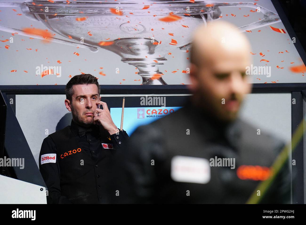 Luca Brecel in action against Mark Selby (left) during the final on day ...