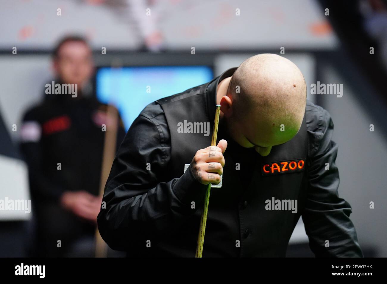 Luca Brecel in action against Mark Selby (left) during the final on day ...