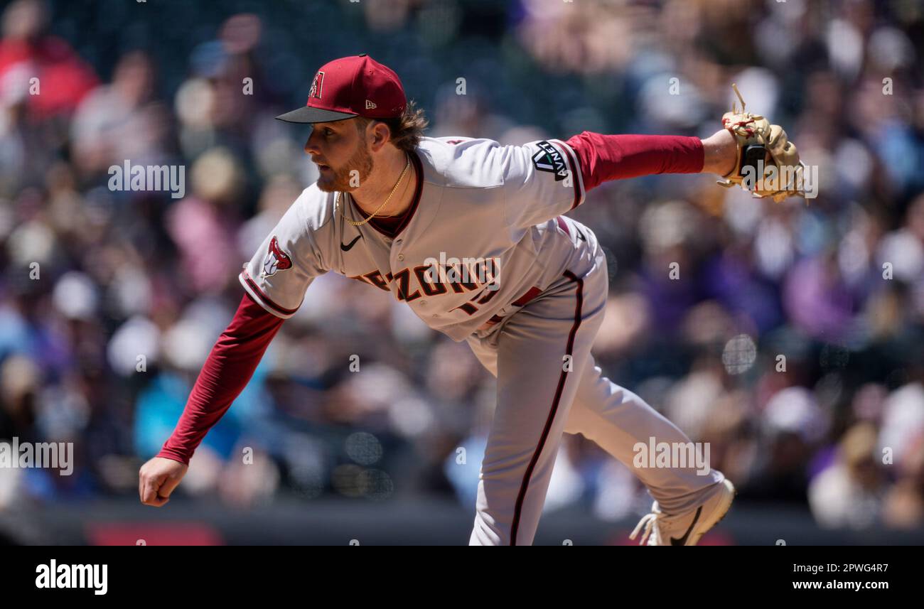 Arizona Diamondbacks starting pitcher Ryne Nelson works against the Colorado Rockies in the ...