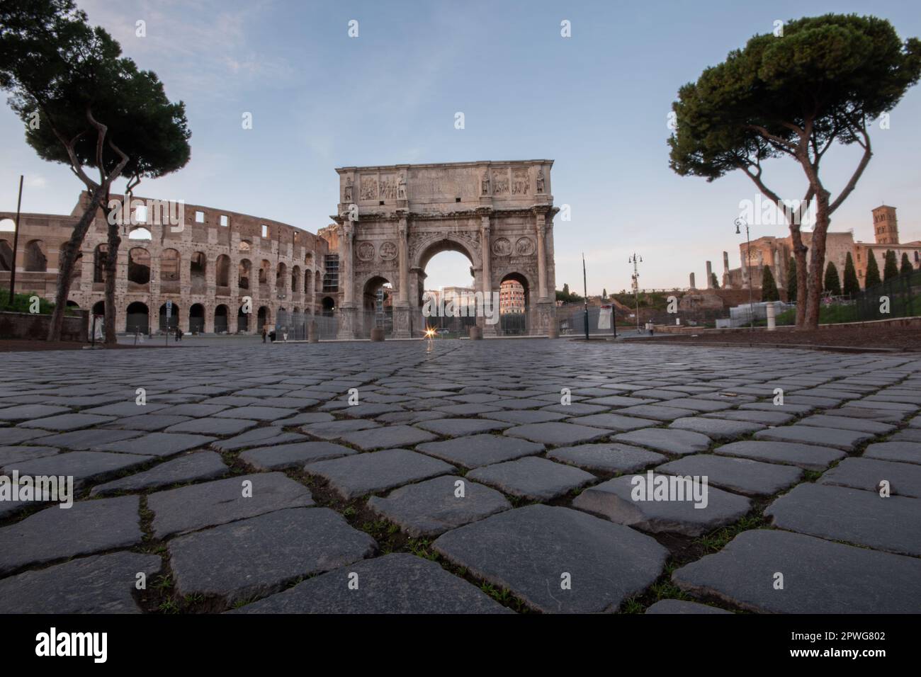 Rome, Italy - View of the Colosseum area at sunrise, focused on the ...