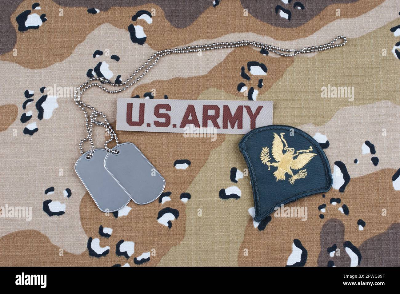 US ARMY specialist rank patch and dog tags on Desert Battle Dress ...