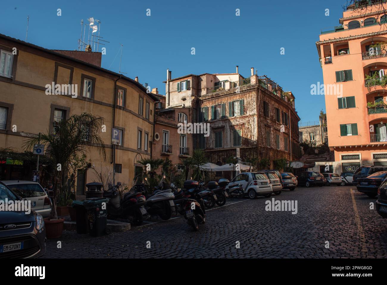 Rome, view on a quiet residential square on Lungotevere, with apartment ...