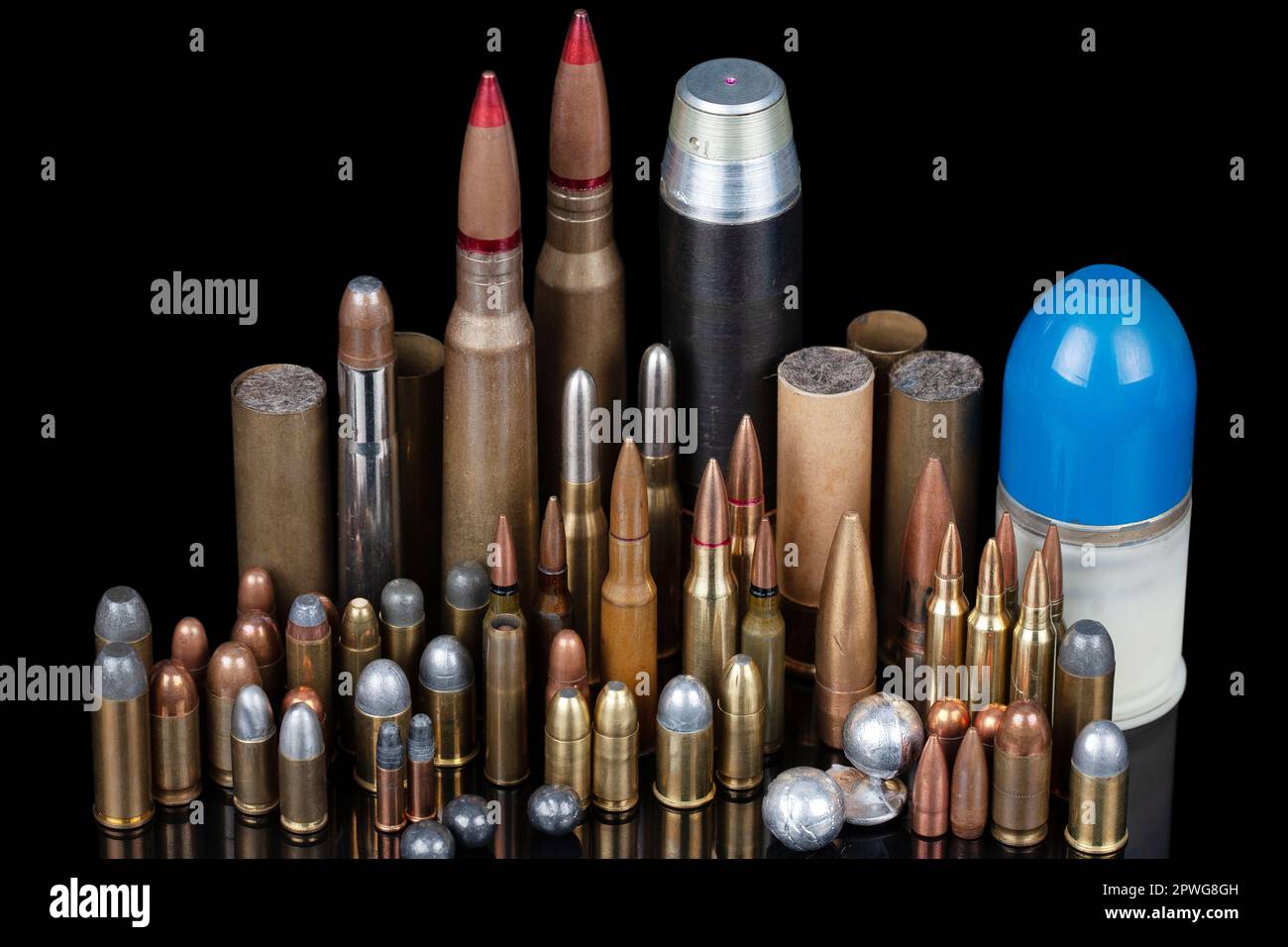 Ammuninition isolated on black background with reflexion. Different ...