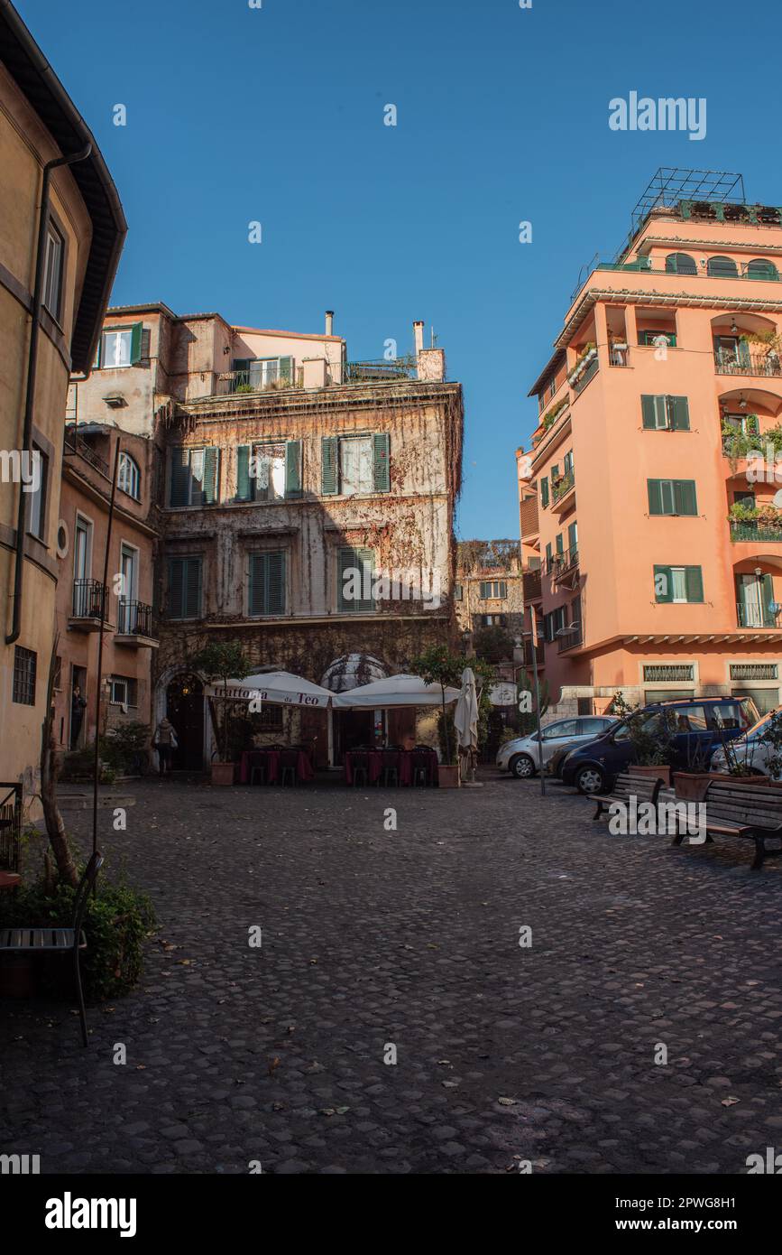 Rome, view on a quiet residential square on Lungotevere, with apartment ...