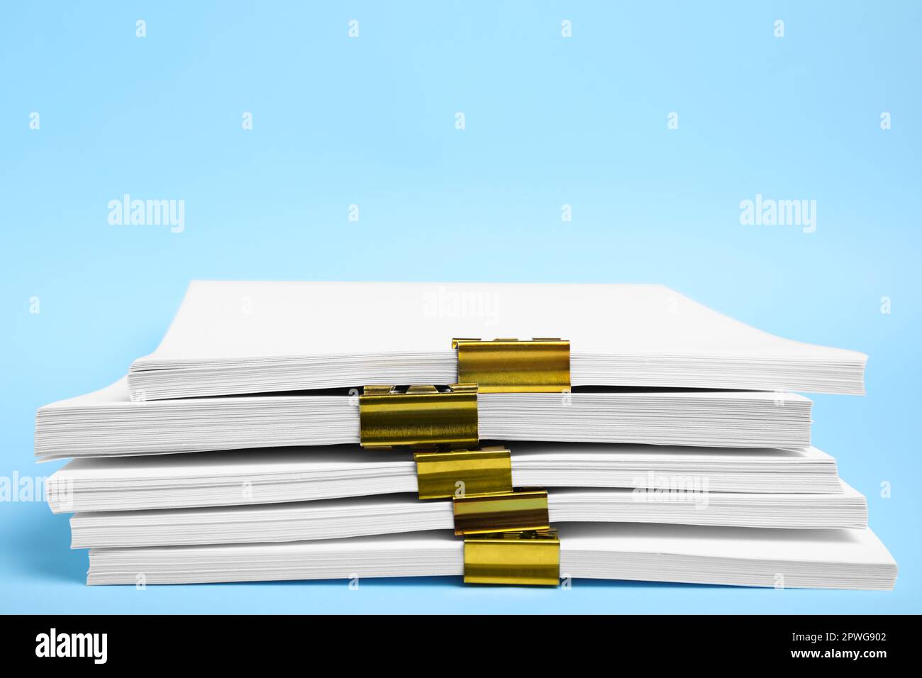 Golden paper fastener hi-res stock photography and images - Alamy