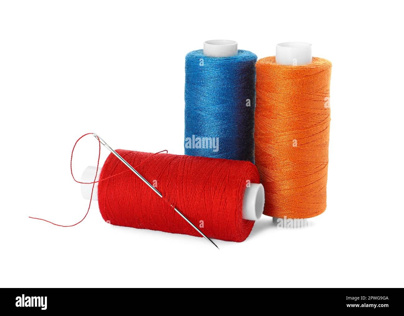 Different colorful sewing threads and needle on white background Stock ...