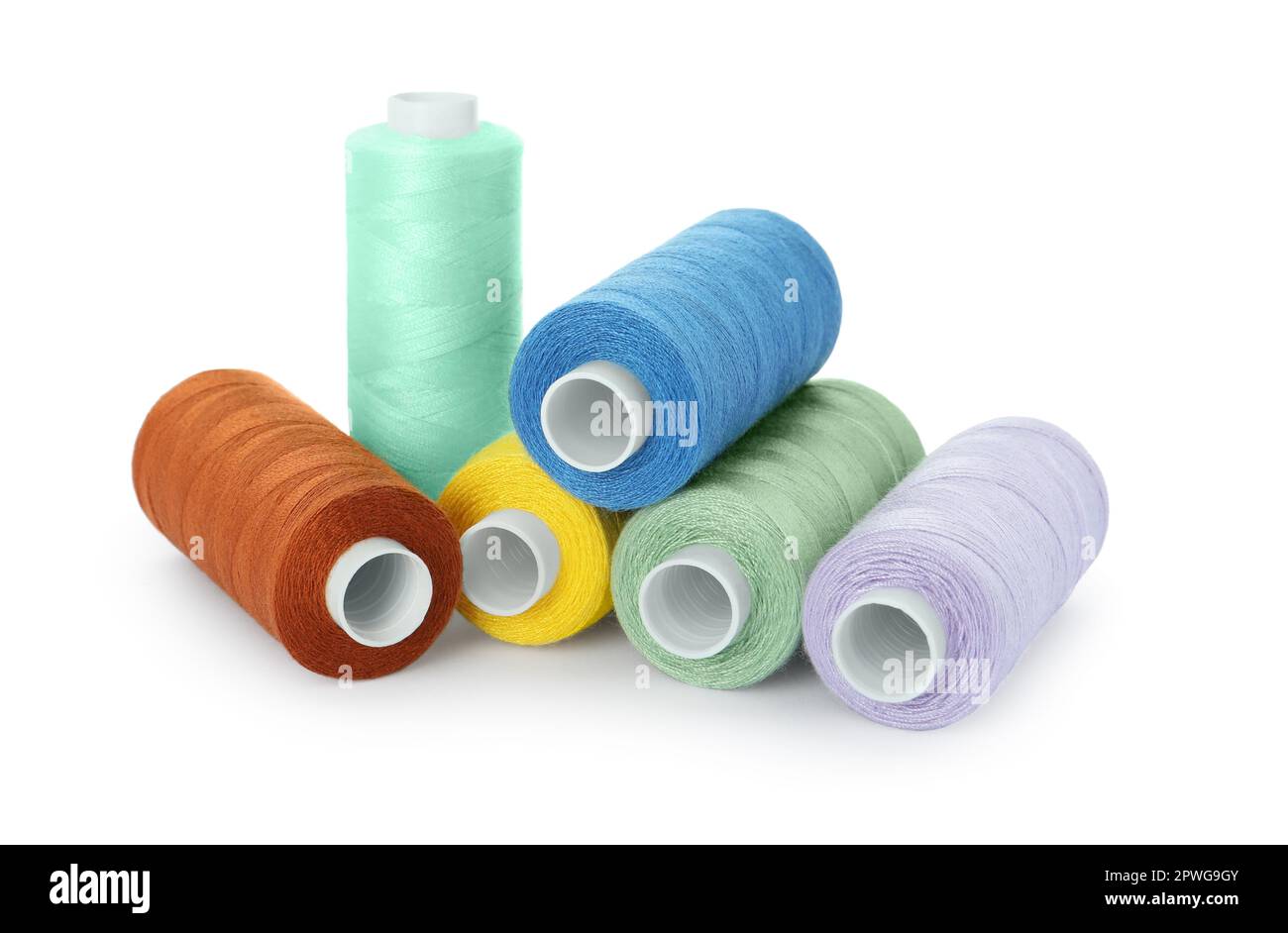 Set of different colorful sewing threads on white background Stock ...