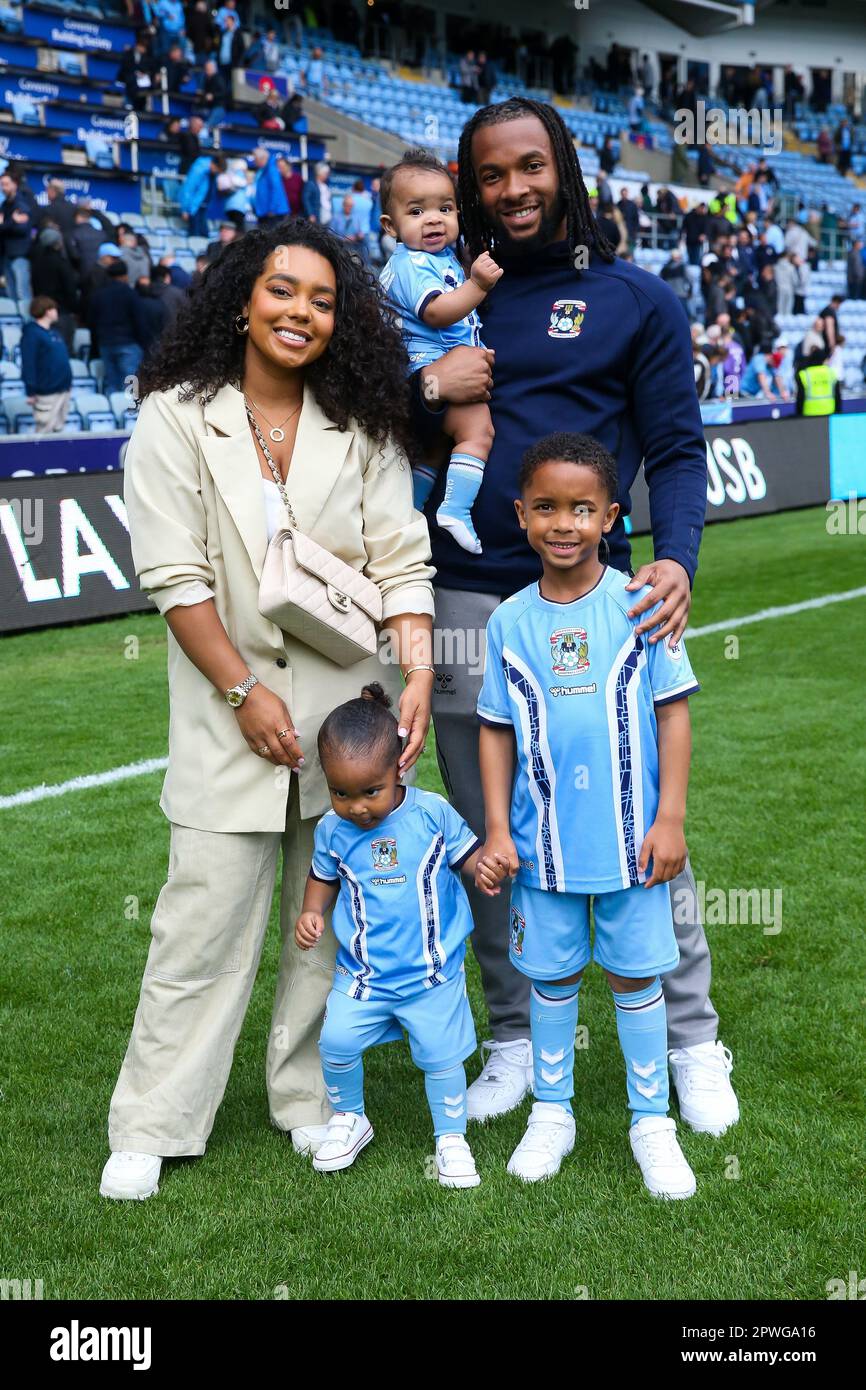 Coventry City's Kasey Palmer and his family on the pitch at the end of ...