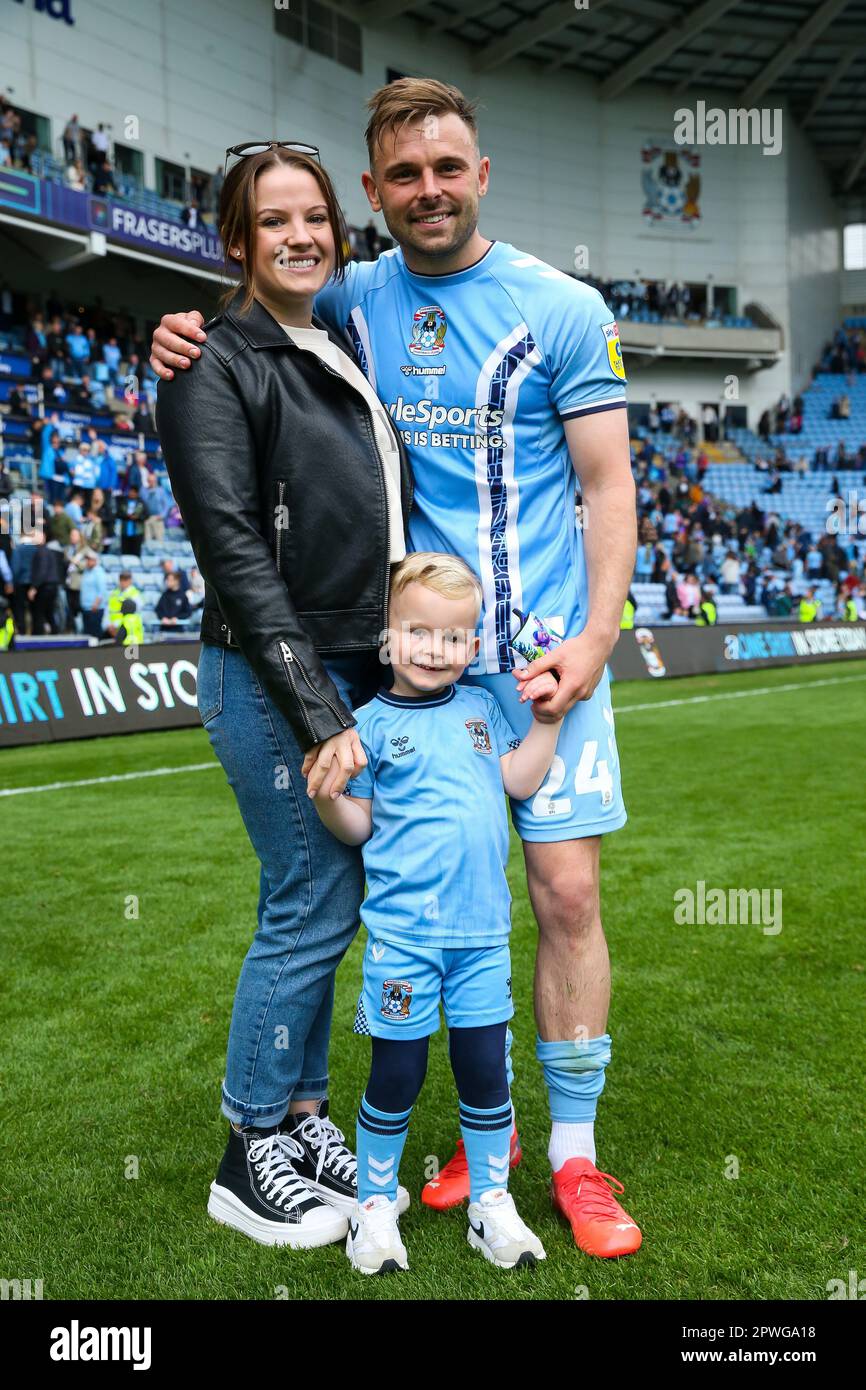 Coventry City's Matthew Godden and his family on the pitch at the end ...