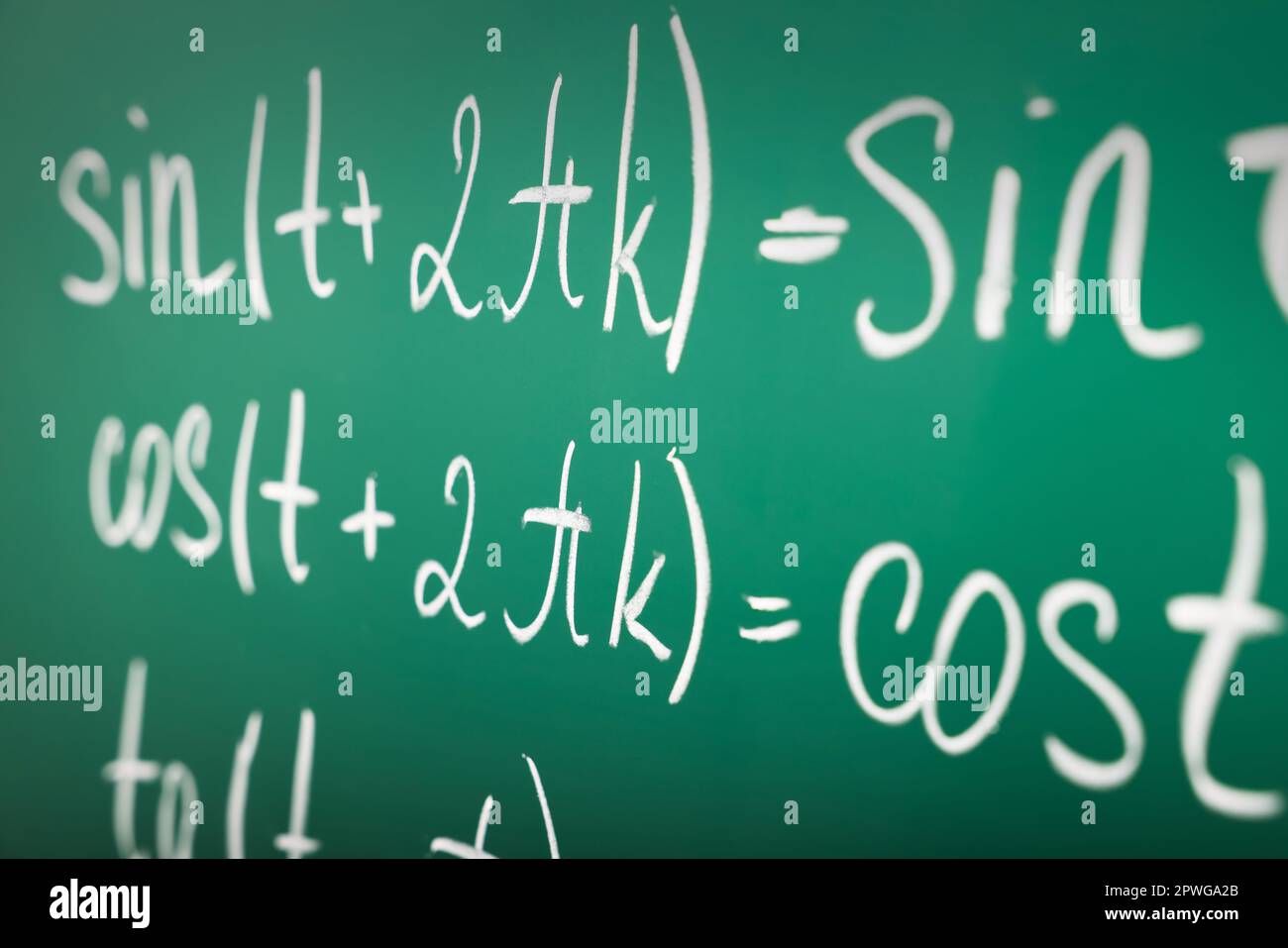 Many different math formulas written on green chalkboard, closeup Stock Photo - Alamy