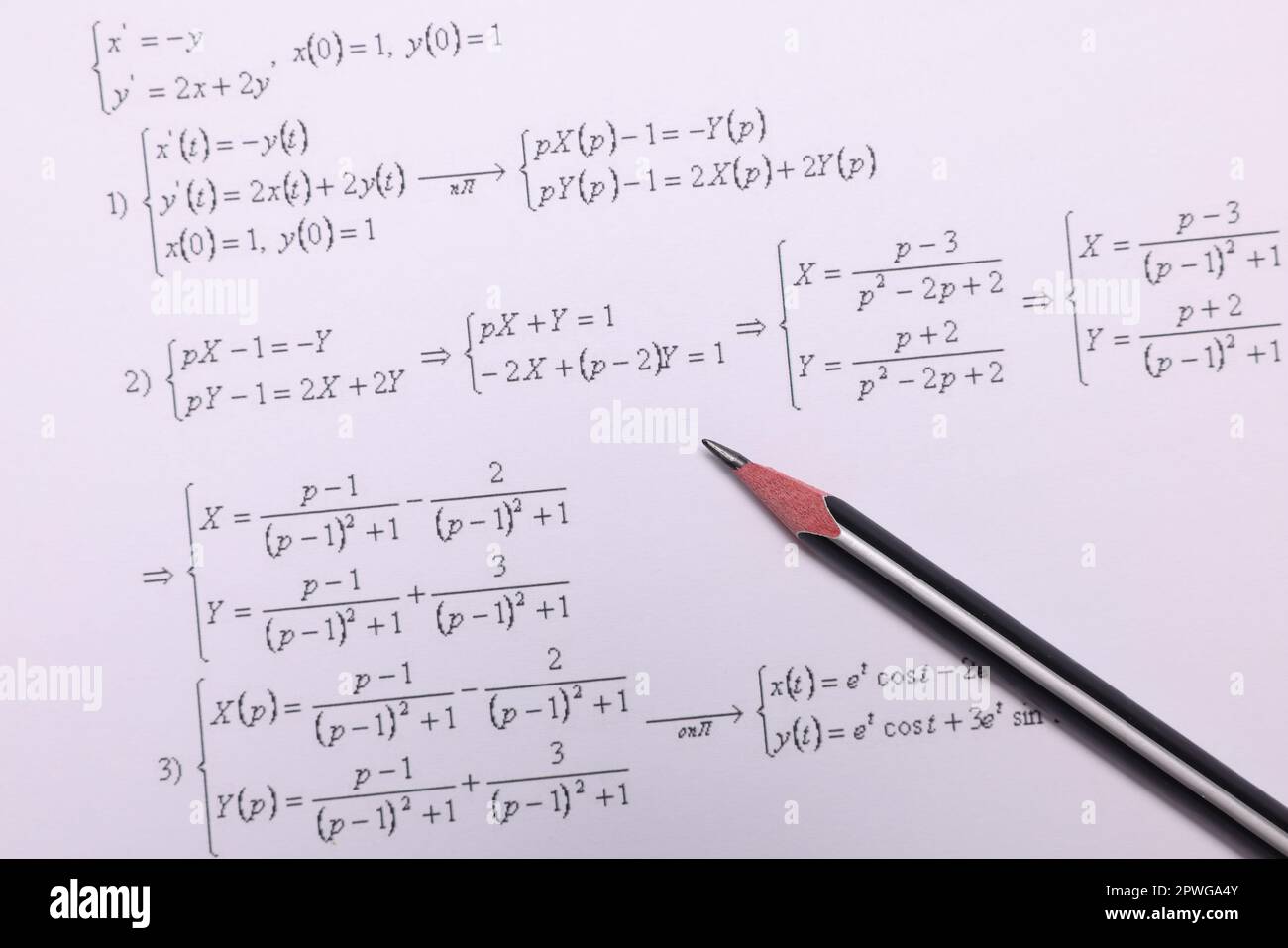 Sheet of paper with mathematical formulas and pencil, top view Stock ...
