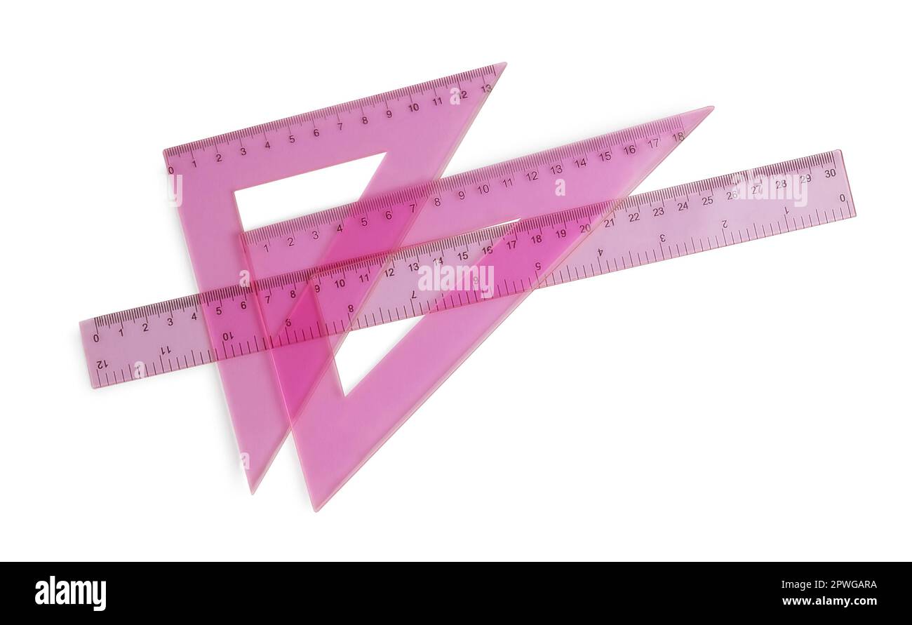 Plastic pink rulers isolated on white, top view Stock Photo - Alamy