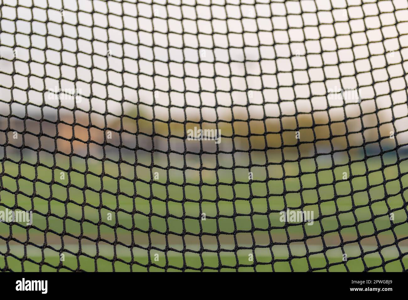 Late afternoon photo of a lacrosse goal on a synthetic turf field ...
