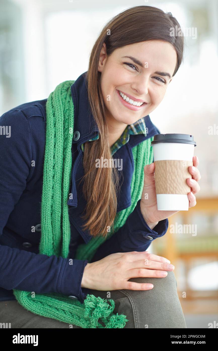 Relief from a cold winters day. Portrait of a gorgeous young woman ...