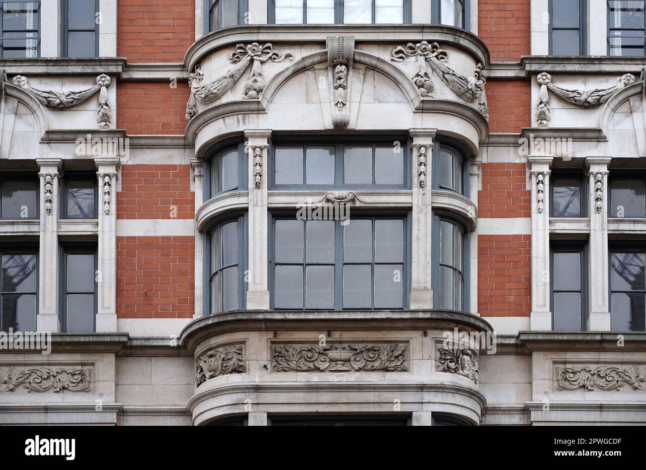 Ornate facade of Victorian office building with bay window Stock Photo ...